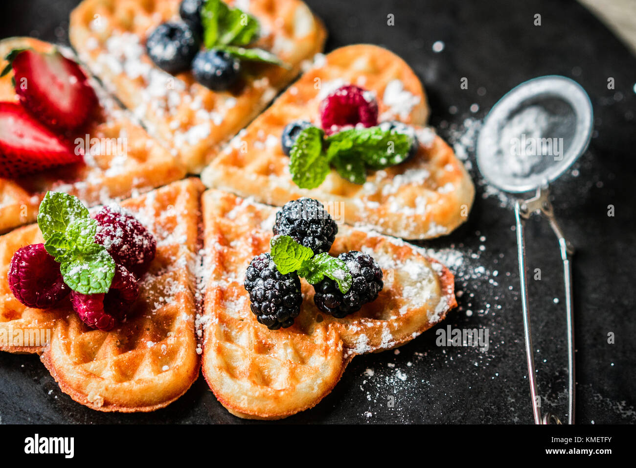 Heart waffles with berries Stock Photo - Alamy
