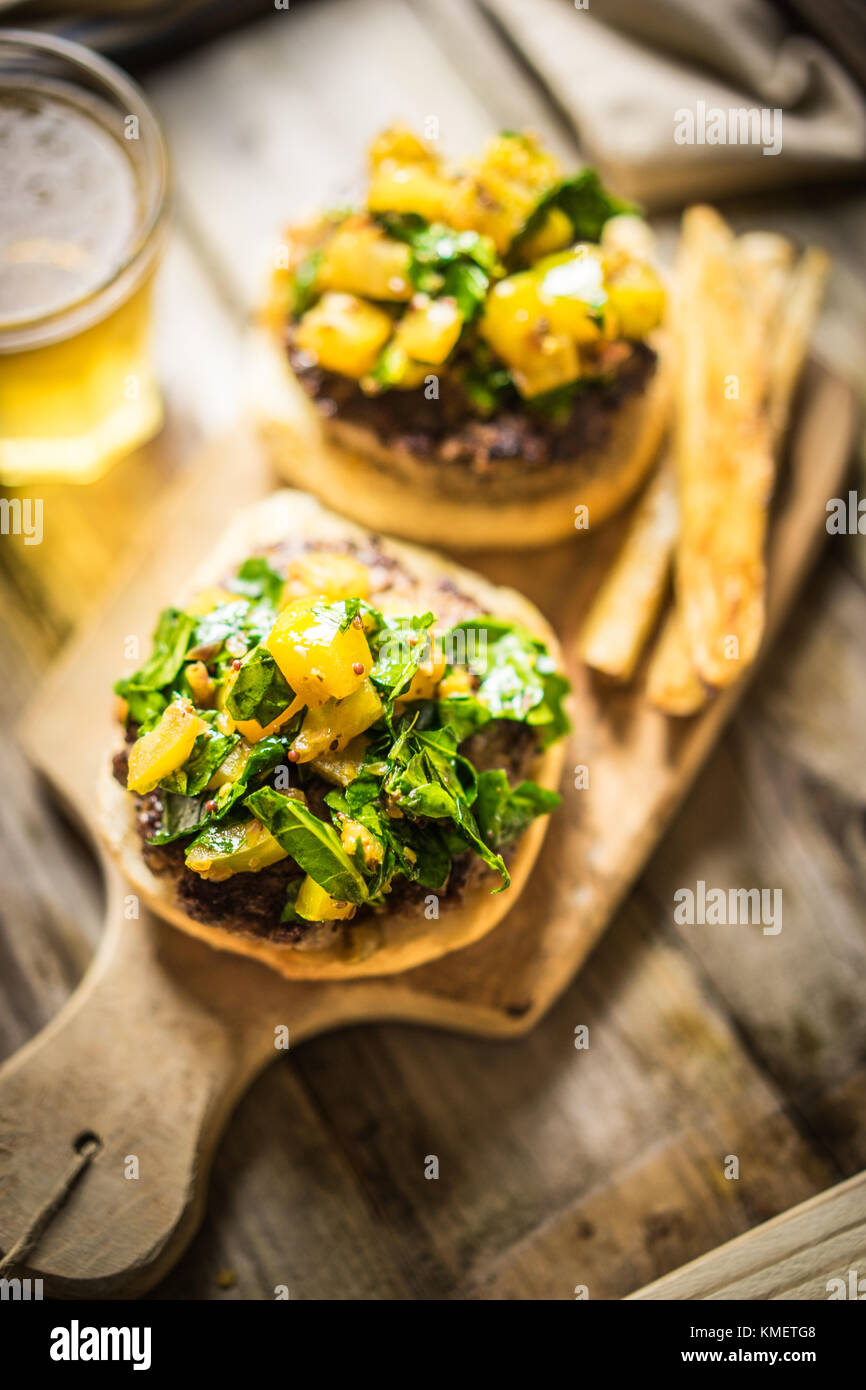 Homemade Burgers With Fries On Wooden Background Stock Photo - Alamy