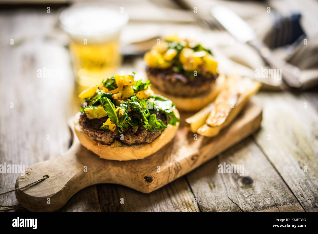 Homemade Burgers With Fries On Wooden Background Stock Photo - Alamy