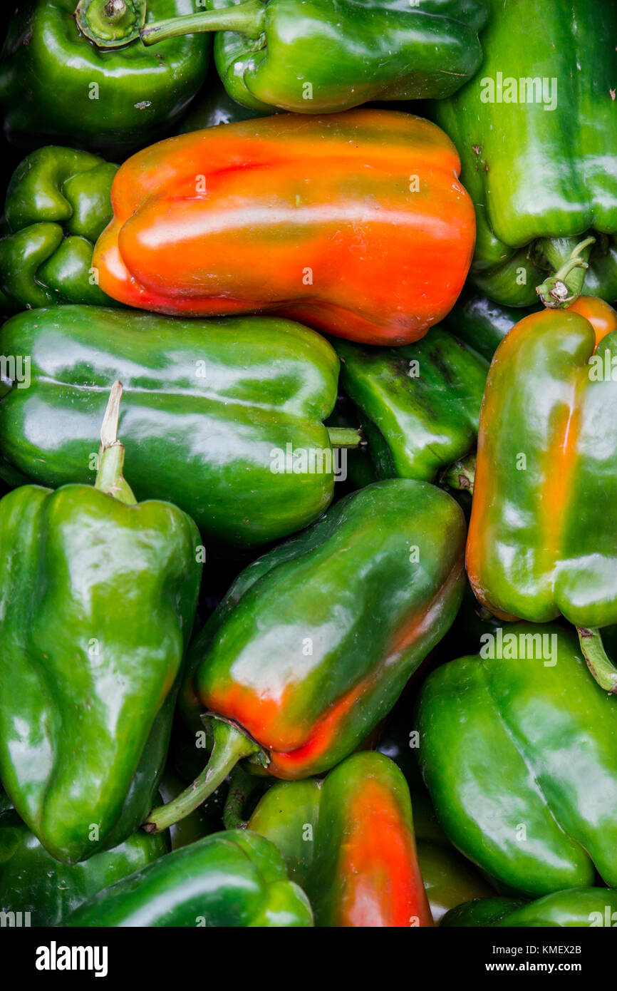 Red and green sweet bell peppers natural background Stock Photo - Alamy