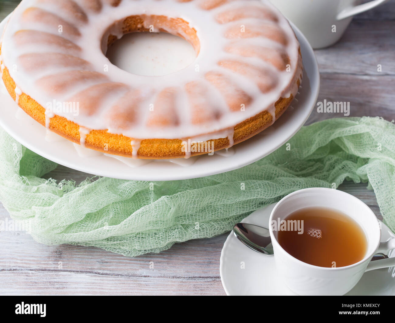 Bundt cake with sugar frosting. Spring breakfast set. Easter festive ...