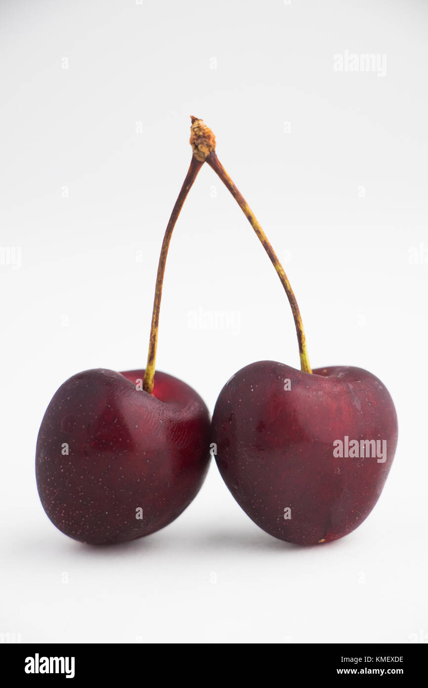 Red cherries isolated with little shadow Stock Photo - Alamy