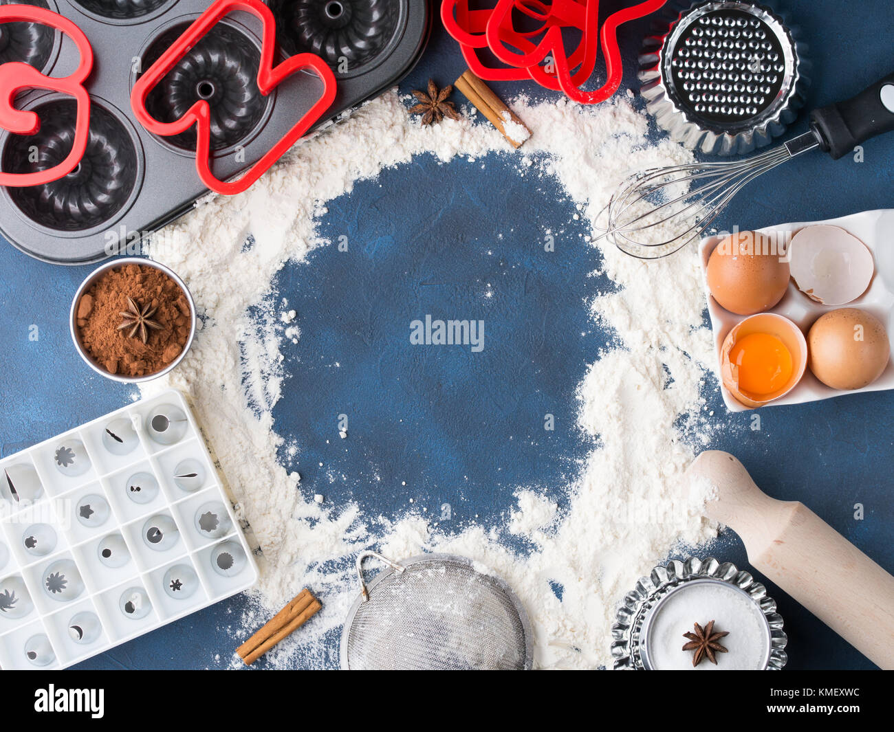 Flour frame Baking concept background on dark blue with tools ...