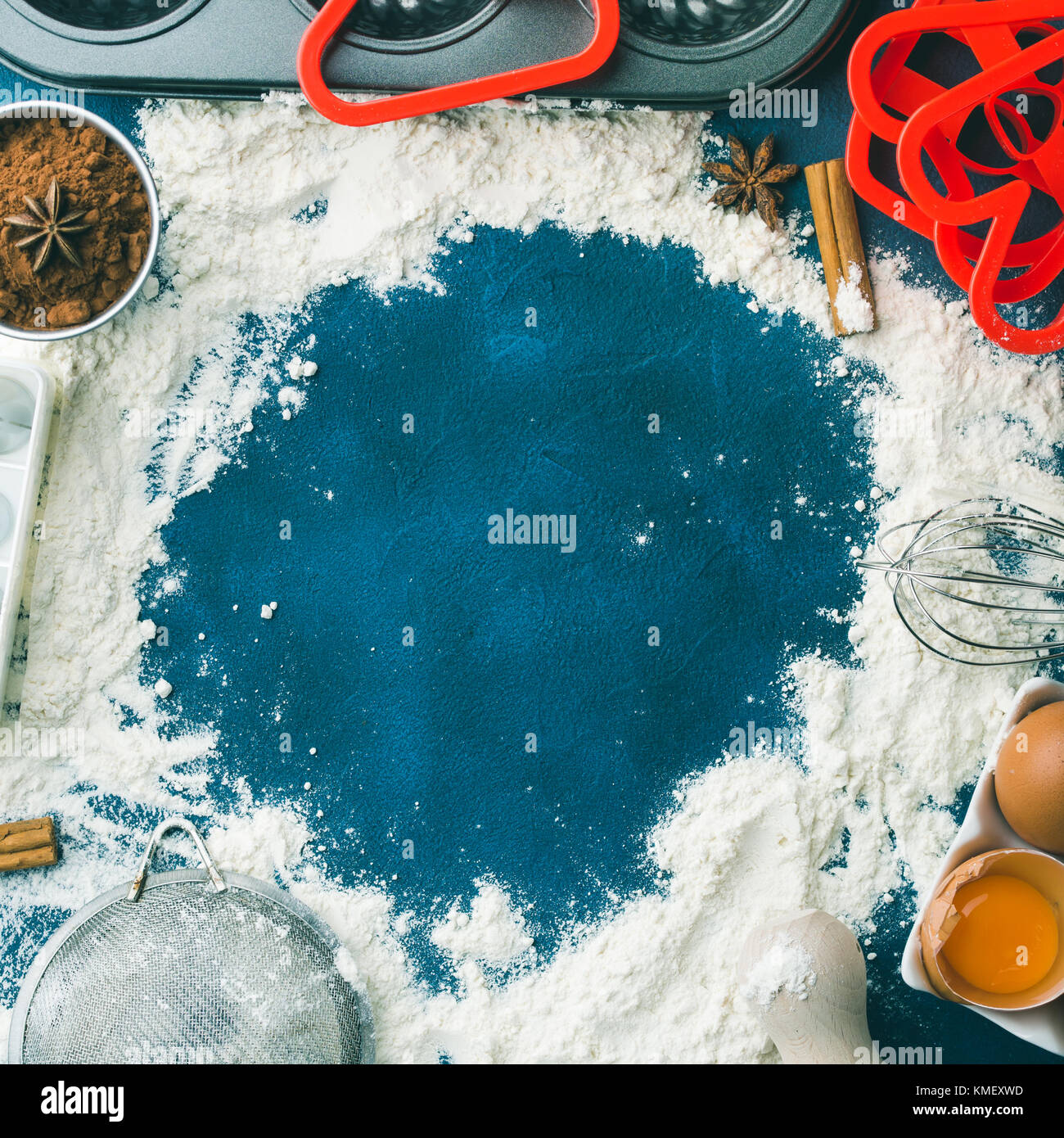 Flour frame Baking concept background on dark blue with tools ...