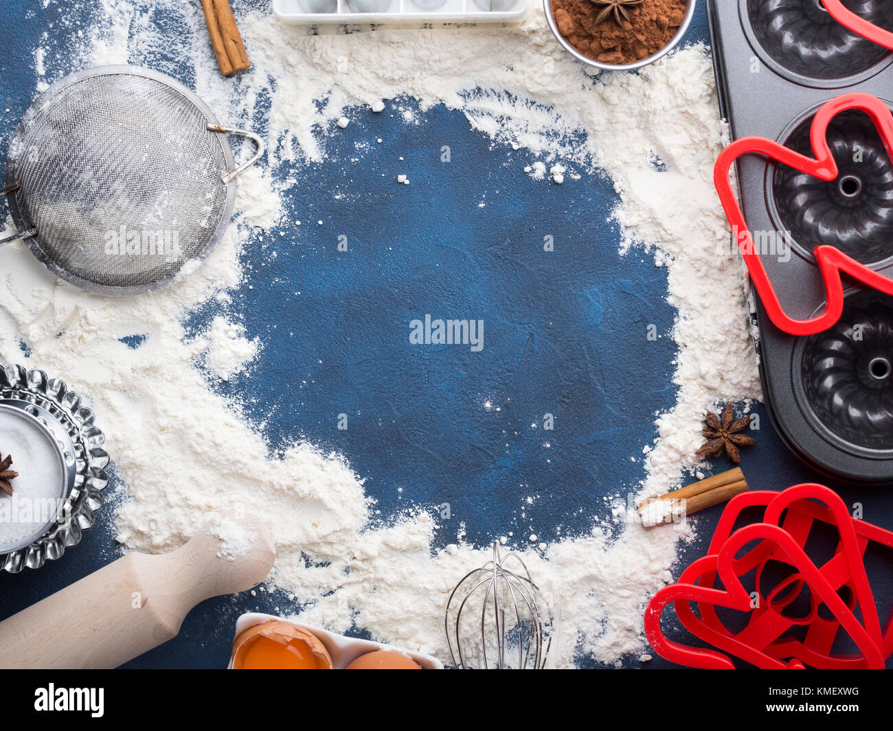 Flour frame Baking concept background on dark blue with tools ...