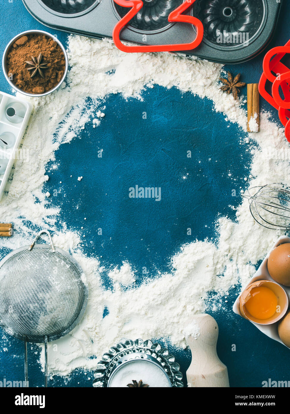 Flour frame Baking concept background on dark blue with tools ...