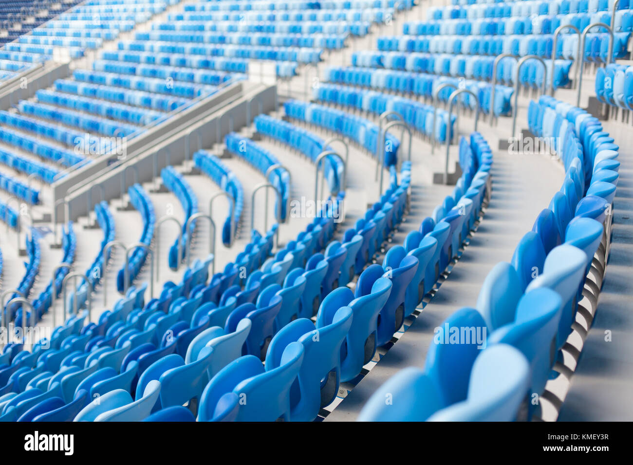 Rows of blue seats at football stadium. Convenient sitting for all ...