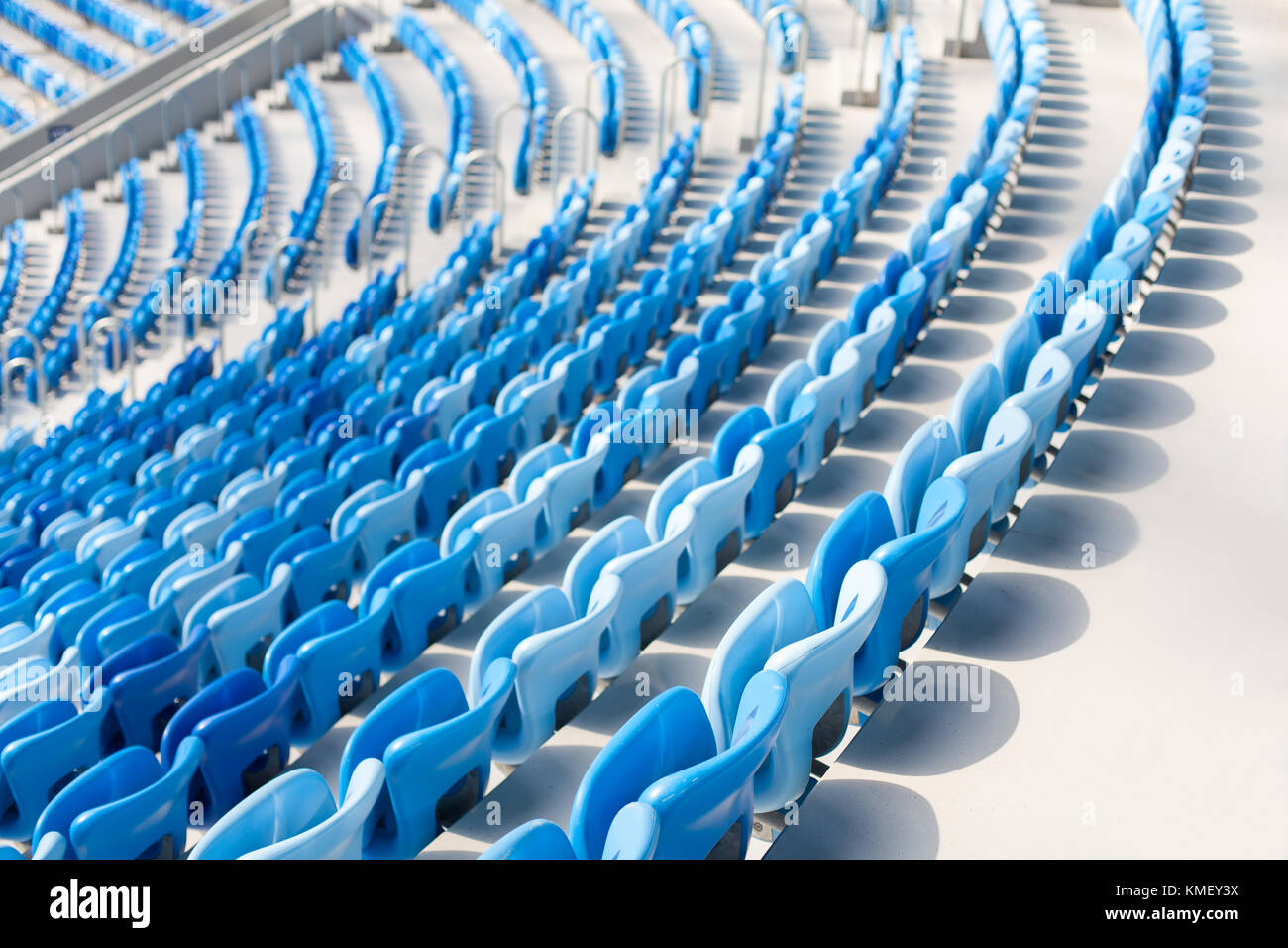 Rows of blue seats at football stadium. Convenient sitting for all ...