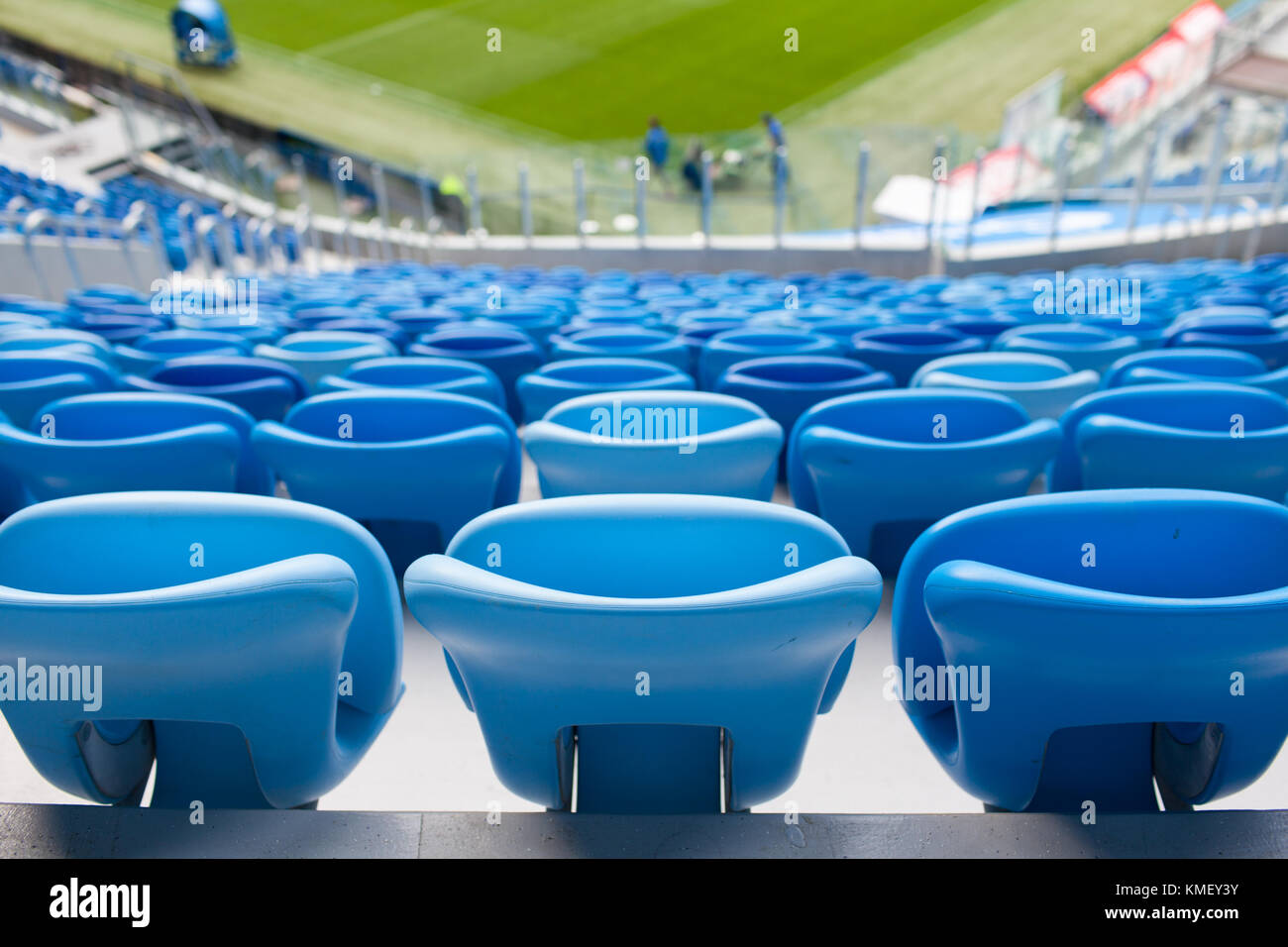 Rows of blue seats at football stadium. Convenient sitting for all ...