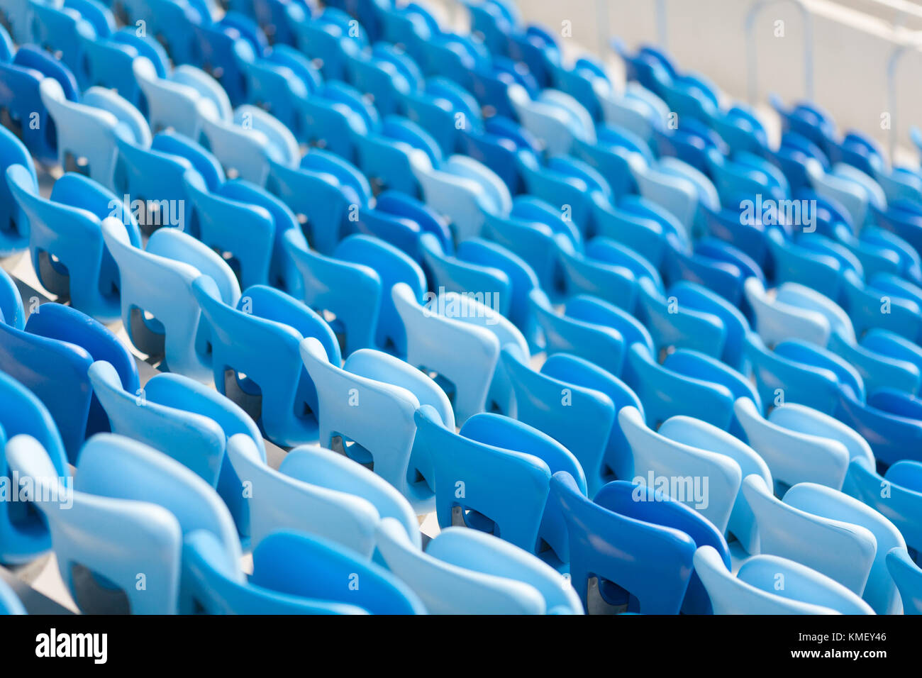 Rows of blue seats at football stadium. Convenient sitting for all ...