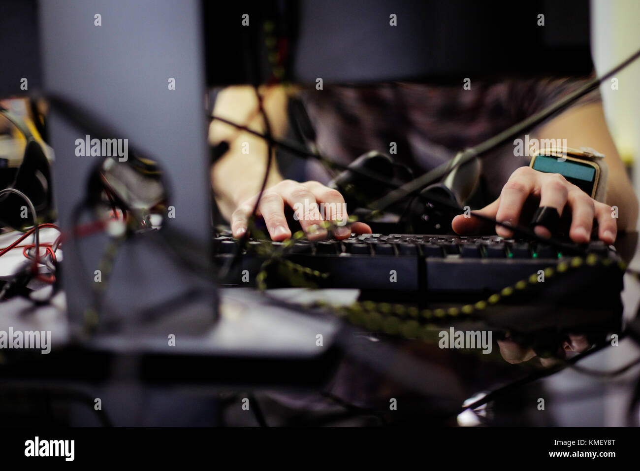 Man uses laptop for coding software Stock Photo - Alamy