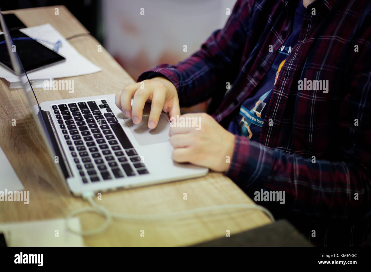 Man uses laptop for coding software Stock Photo - Alamy