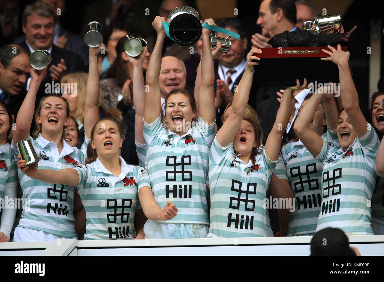 Cambridge women's captain Lara Gibson lifts the winners cup after the ...