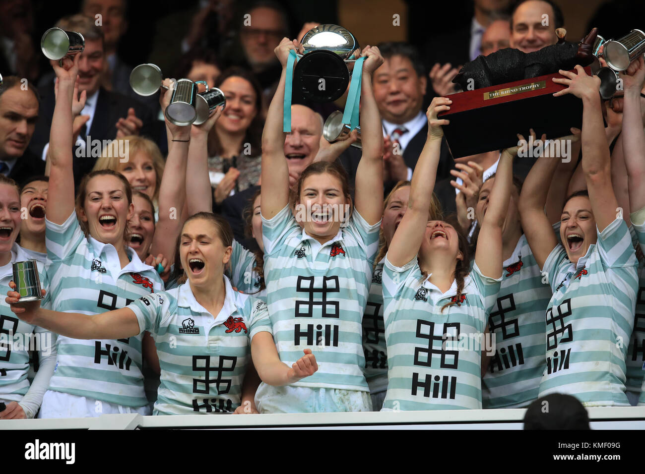 Cambridge women's captain Lara Gibson lifts the winners cup after the ...