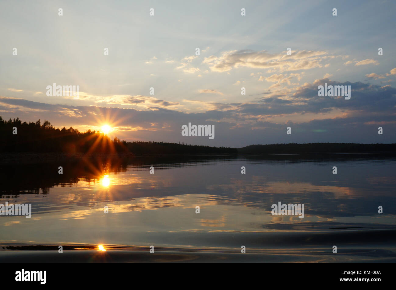 Photo of sunset at lake Stock Photo - Alamy