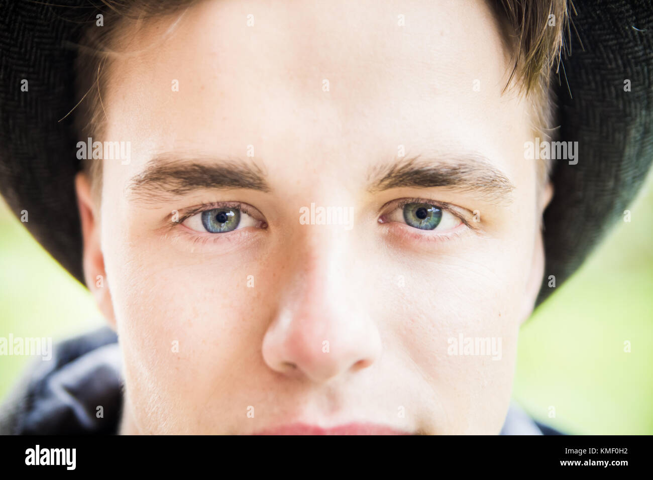 close-up picture of blue eyes from a young man Stock Photo - Alamy