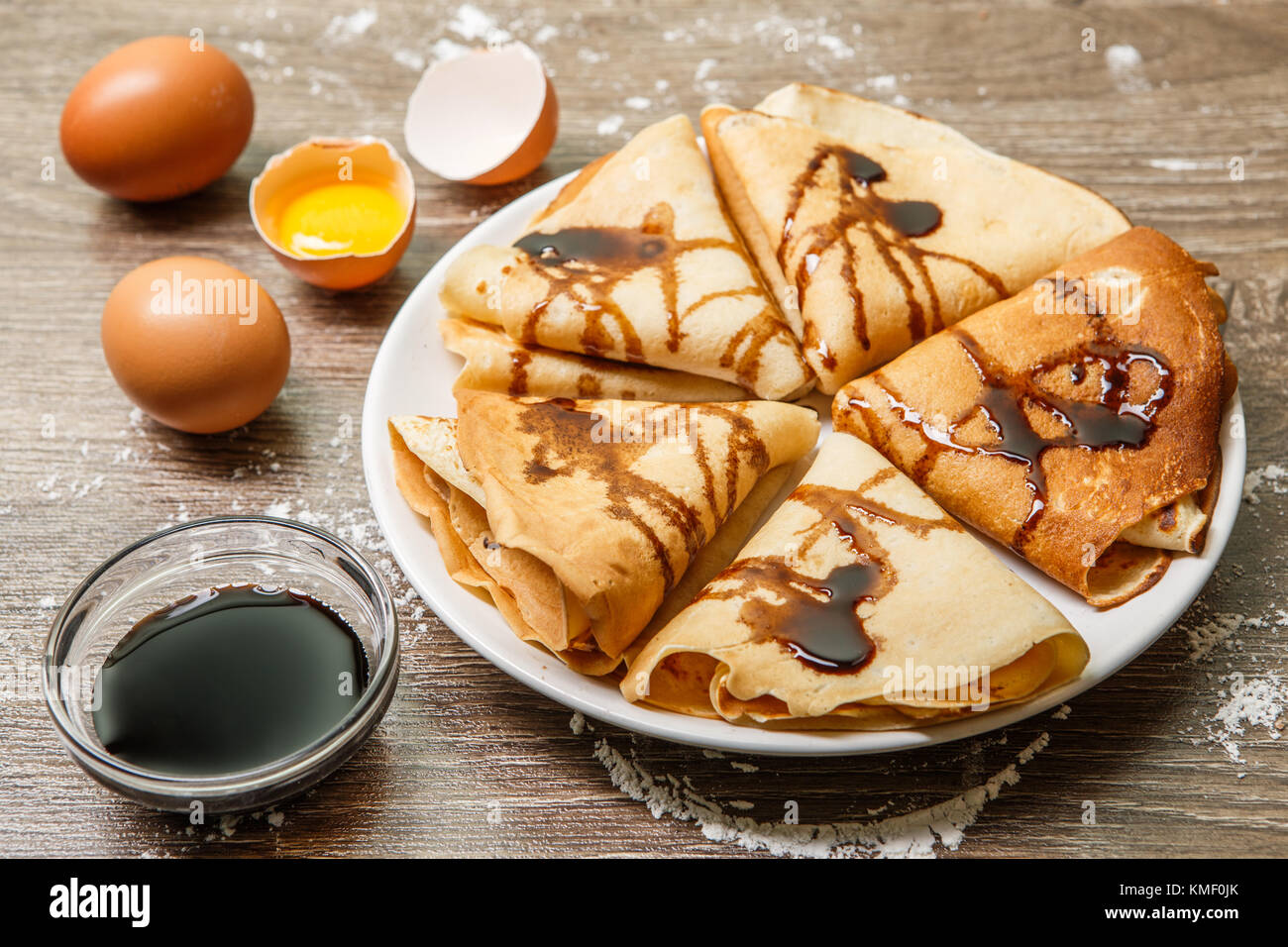 Dining table with pancakes topped Stock Photo - Alamy