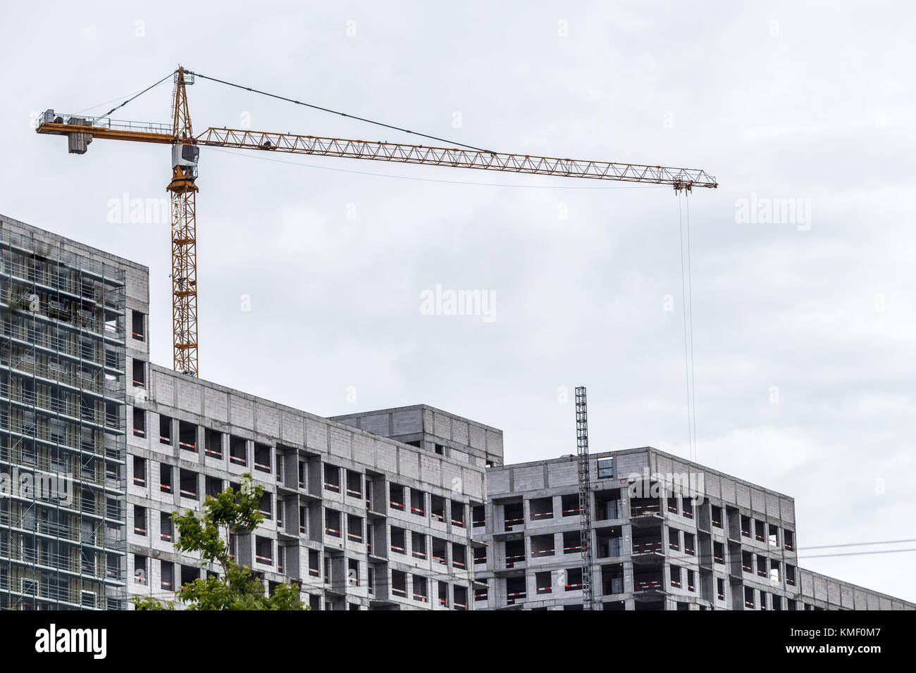 Crains on construction site of building Stock Photo - Alamy