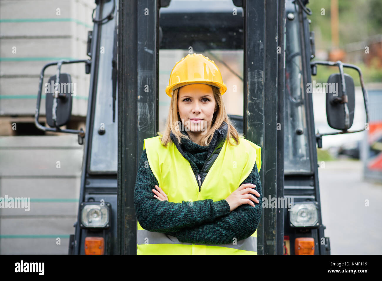 Woman forklift truck driver in an industrial area Stock Photo - Alamy