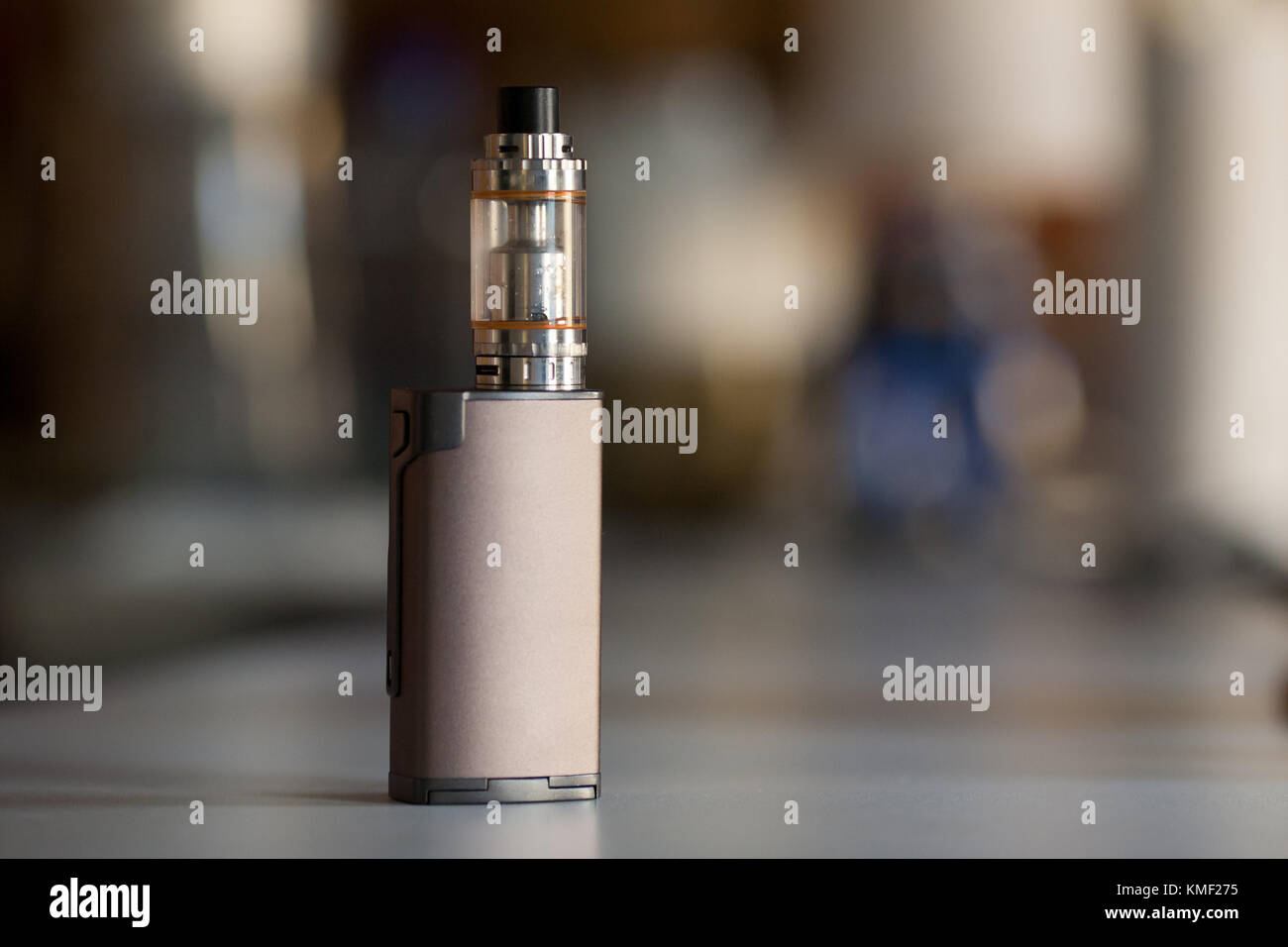 vape, electronic cigarette. blurred background. Popular smoking gadget ...