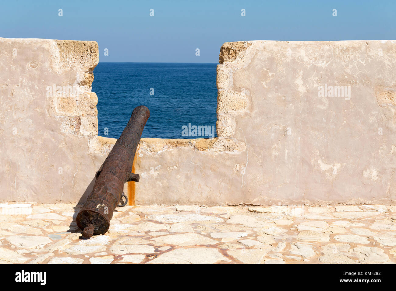 Old rusty cannon at the fortress of Firka. Greece. The island of Crete ...