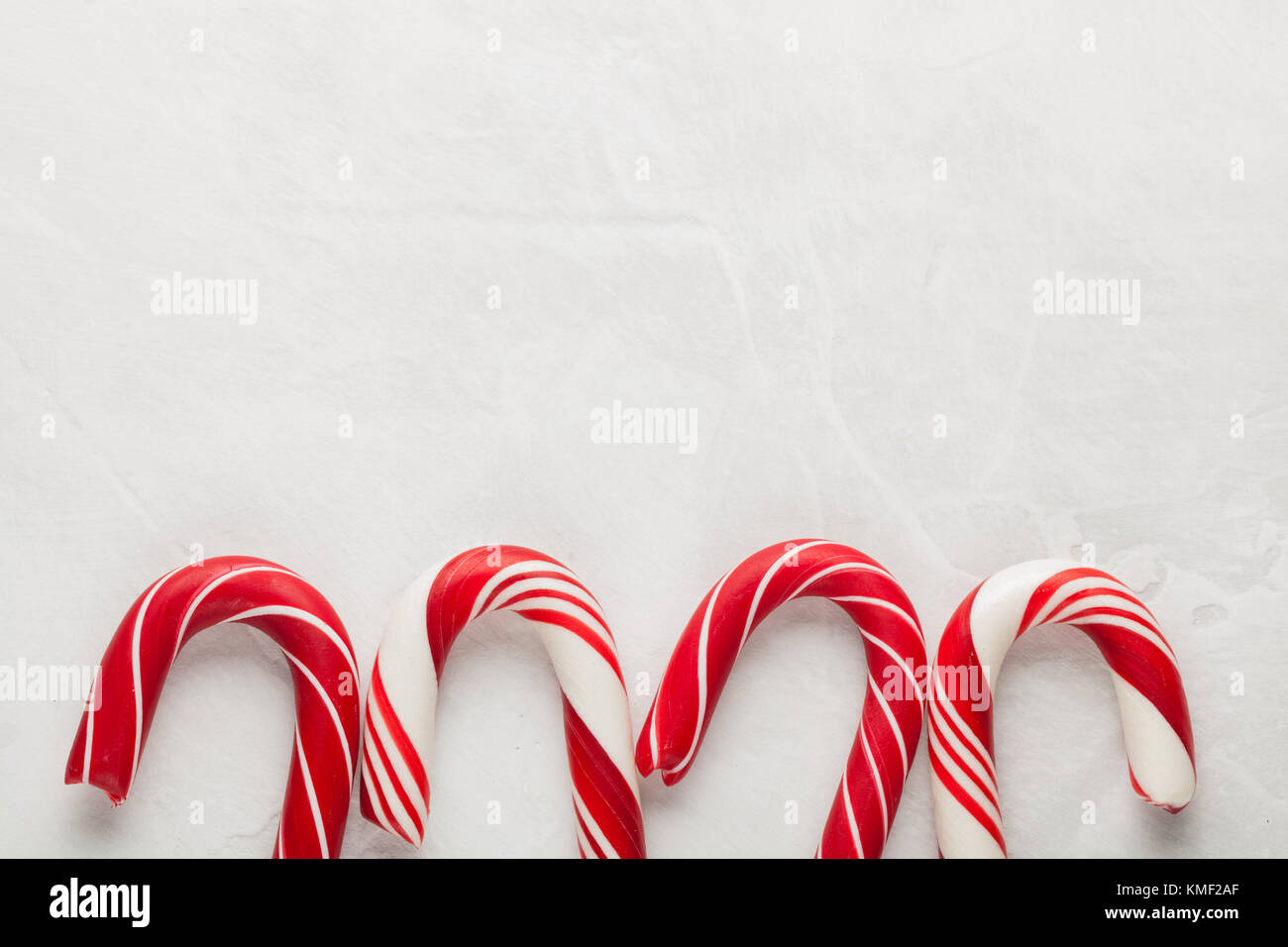 Christmas decors with gray background. Candy cane. Top view with copy ...