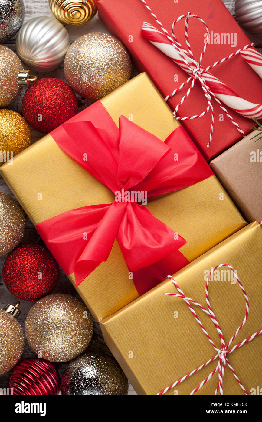 Colored boxes with gifts in a festive box with Christmas decorations ...