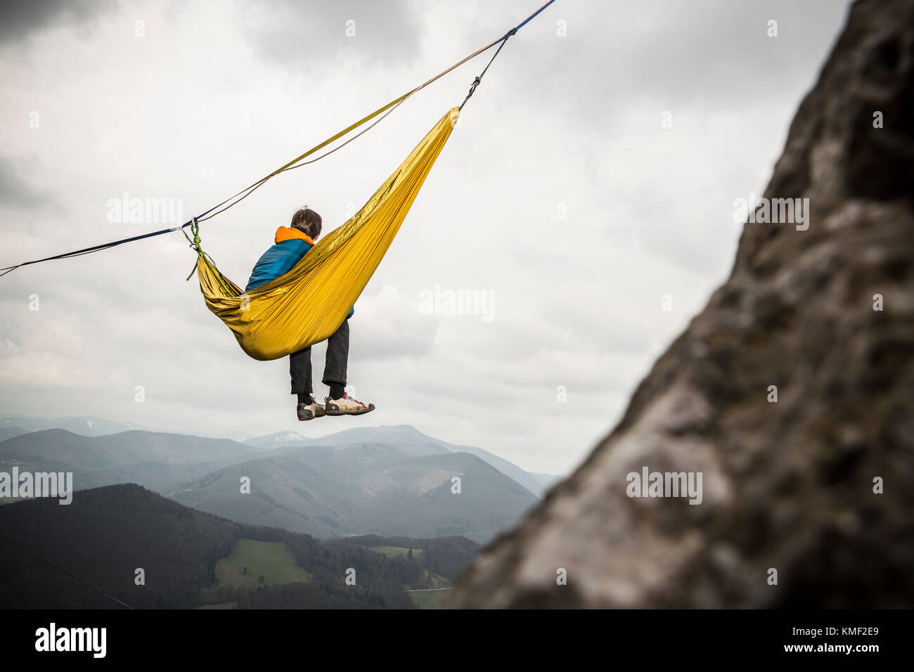 Person sitting in hammock and hanging on slack line in Lower Alps,Lower ...