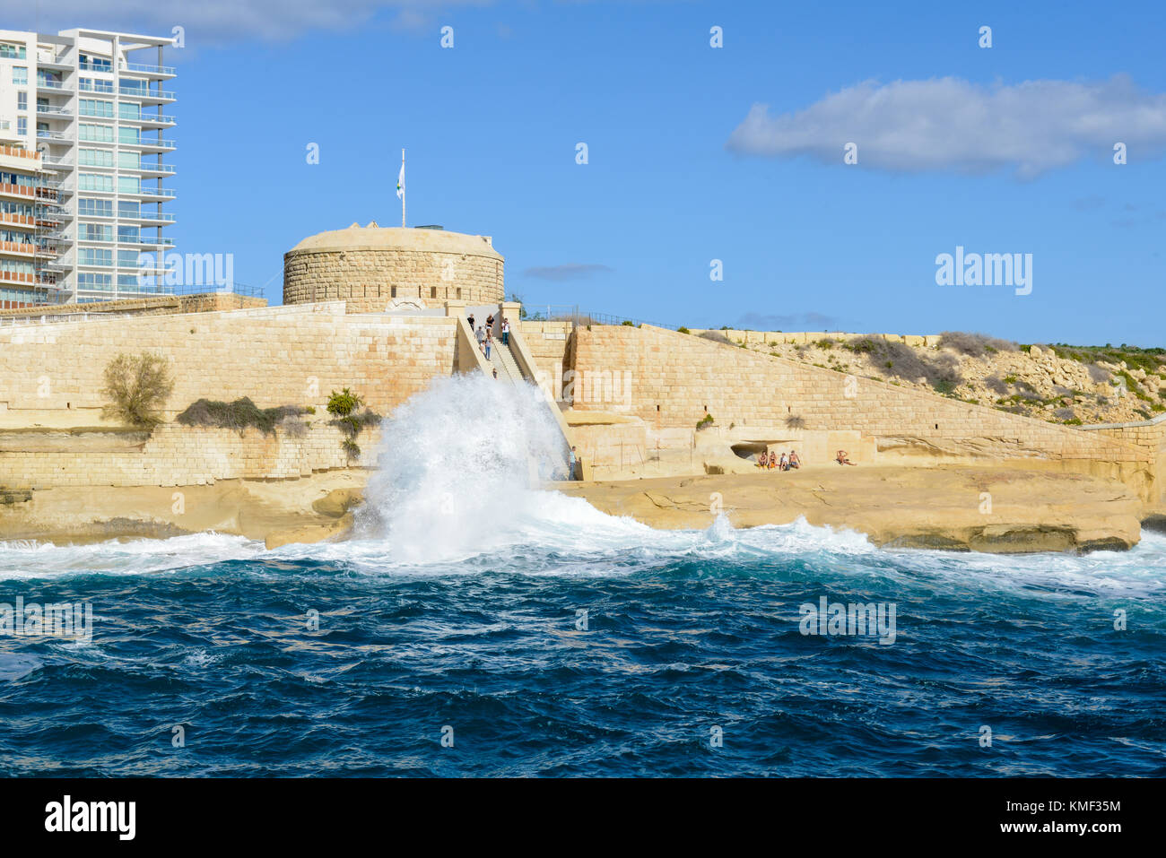 Sliema, Malta - 2 November 2017: people watching the waves at fort ...