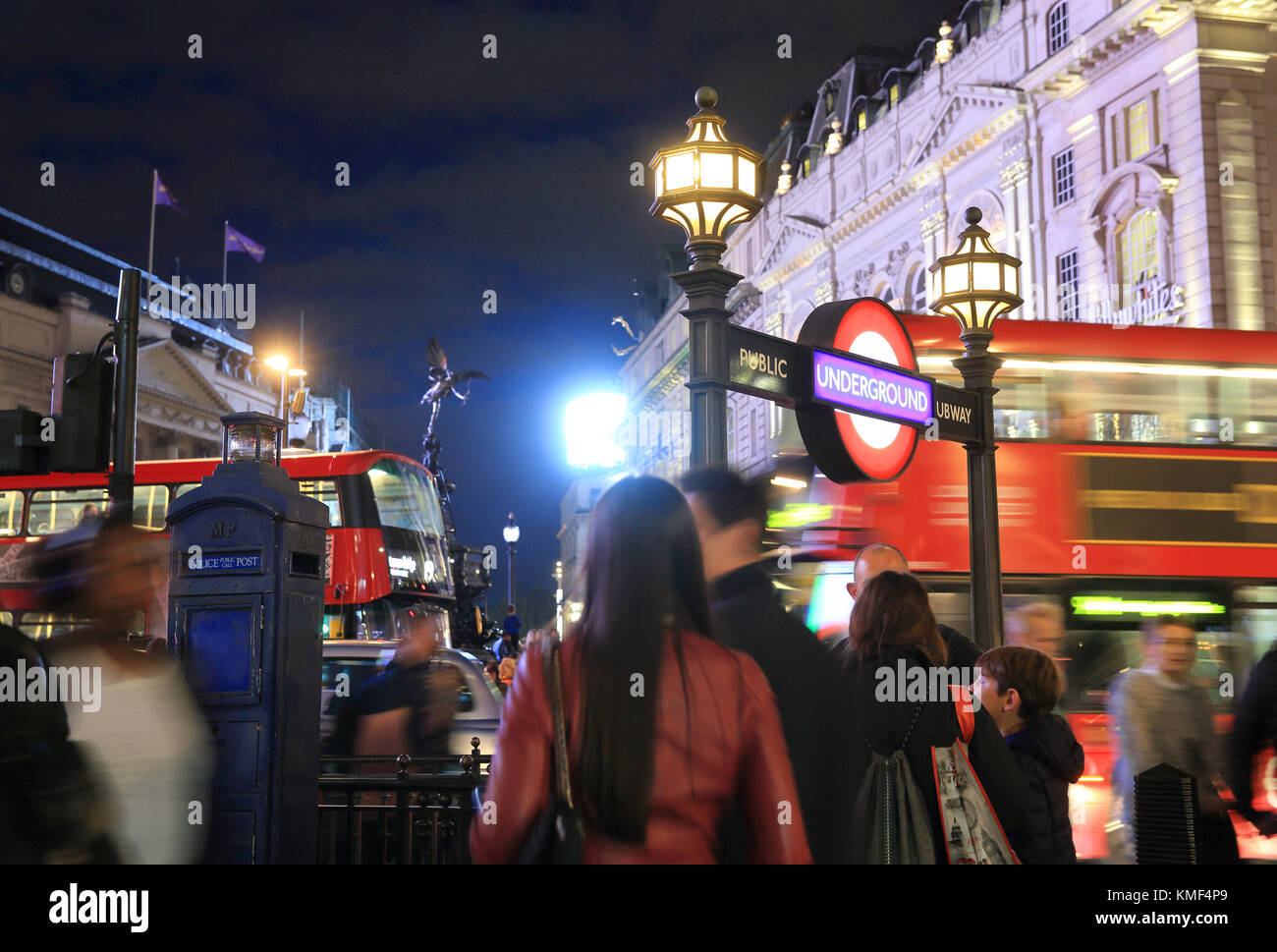 Busy Piccadilly Circus at dusk, in wintertime, in central London ...