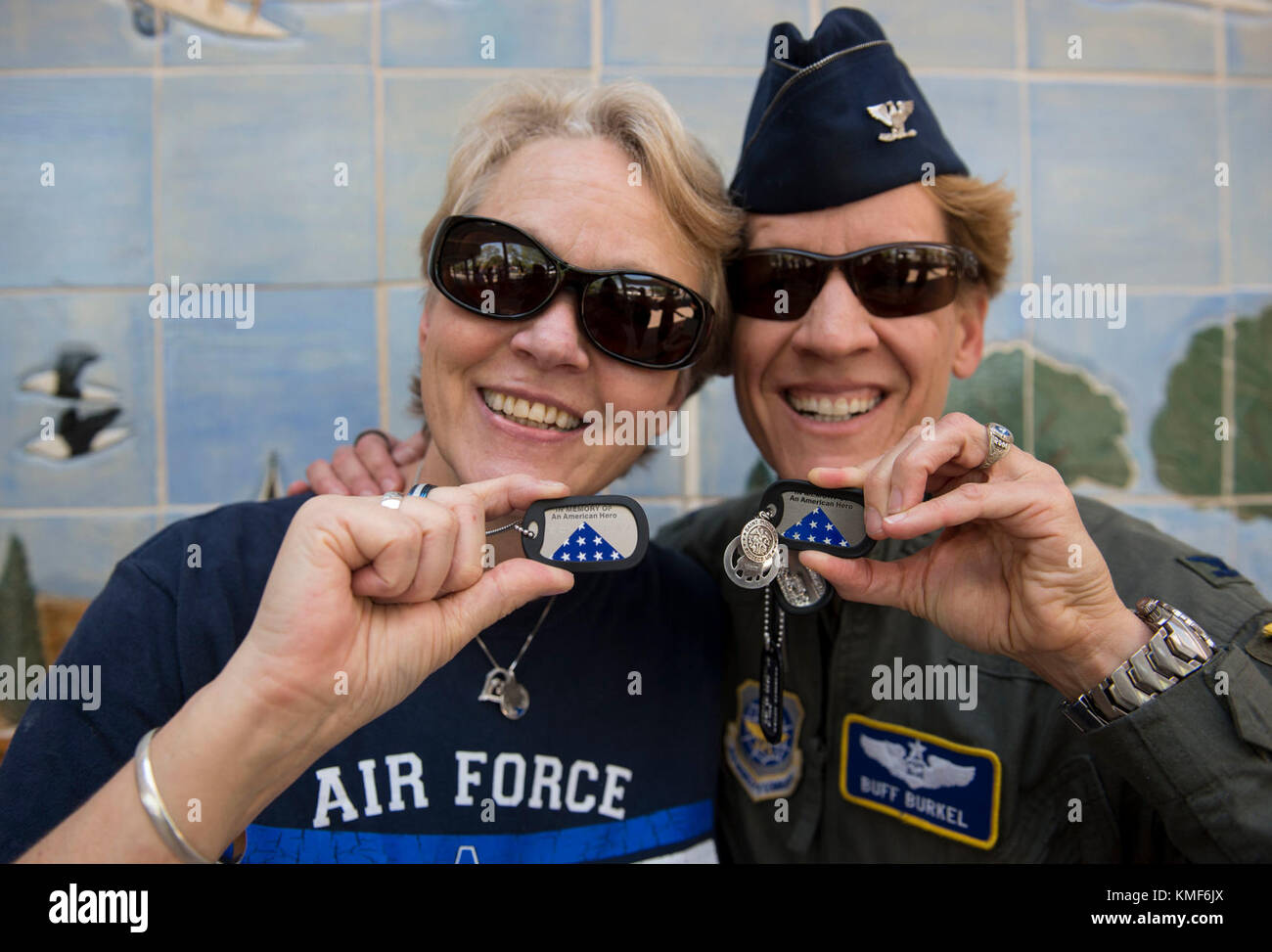 Cathy Berlin-Obregon, a gold star family member, and Col. Laurel "Buff" Burkel, Air Mobility ...