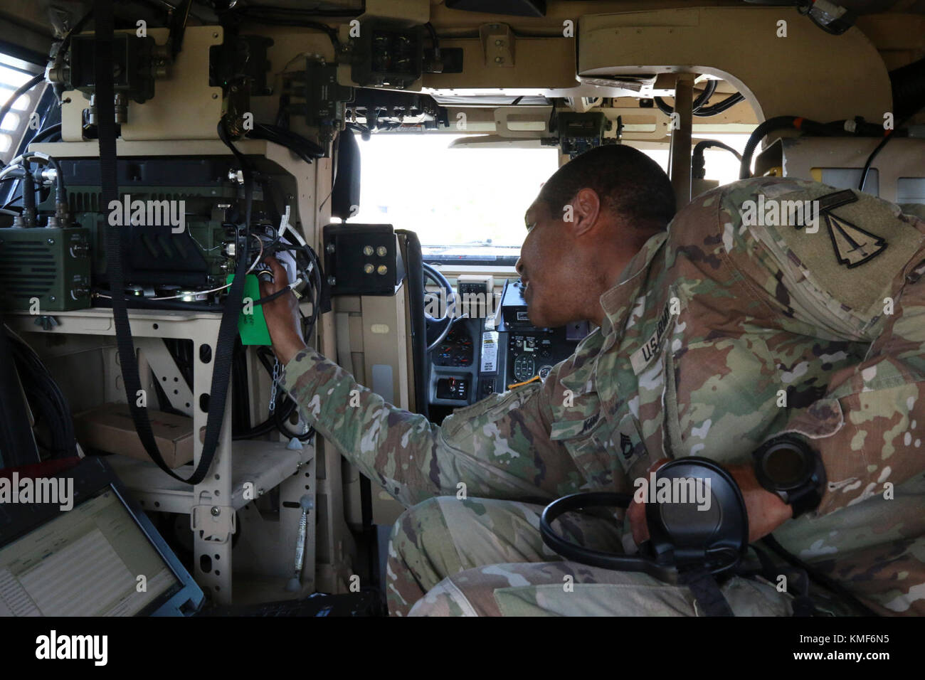 Sgt. 1st Class Douglas King, communication section chief, 4th battalion ...