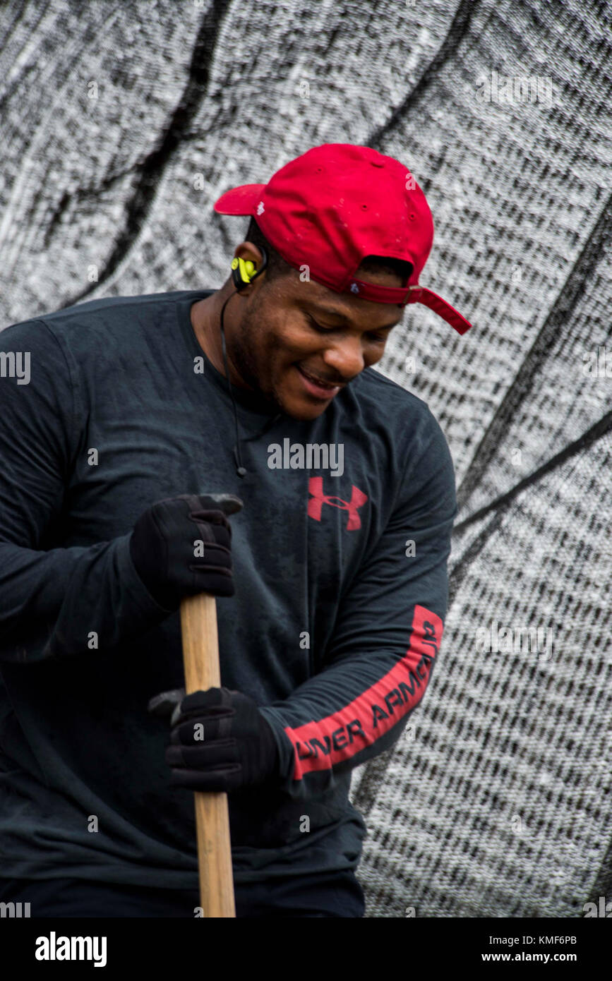 U.S. Navy Petty Officer 2nd Class Michael Scaife, an augment deployed ...