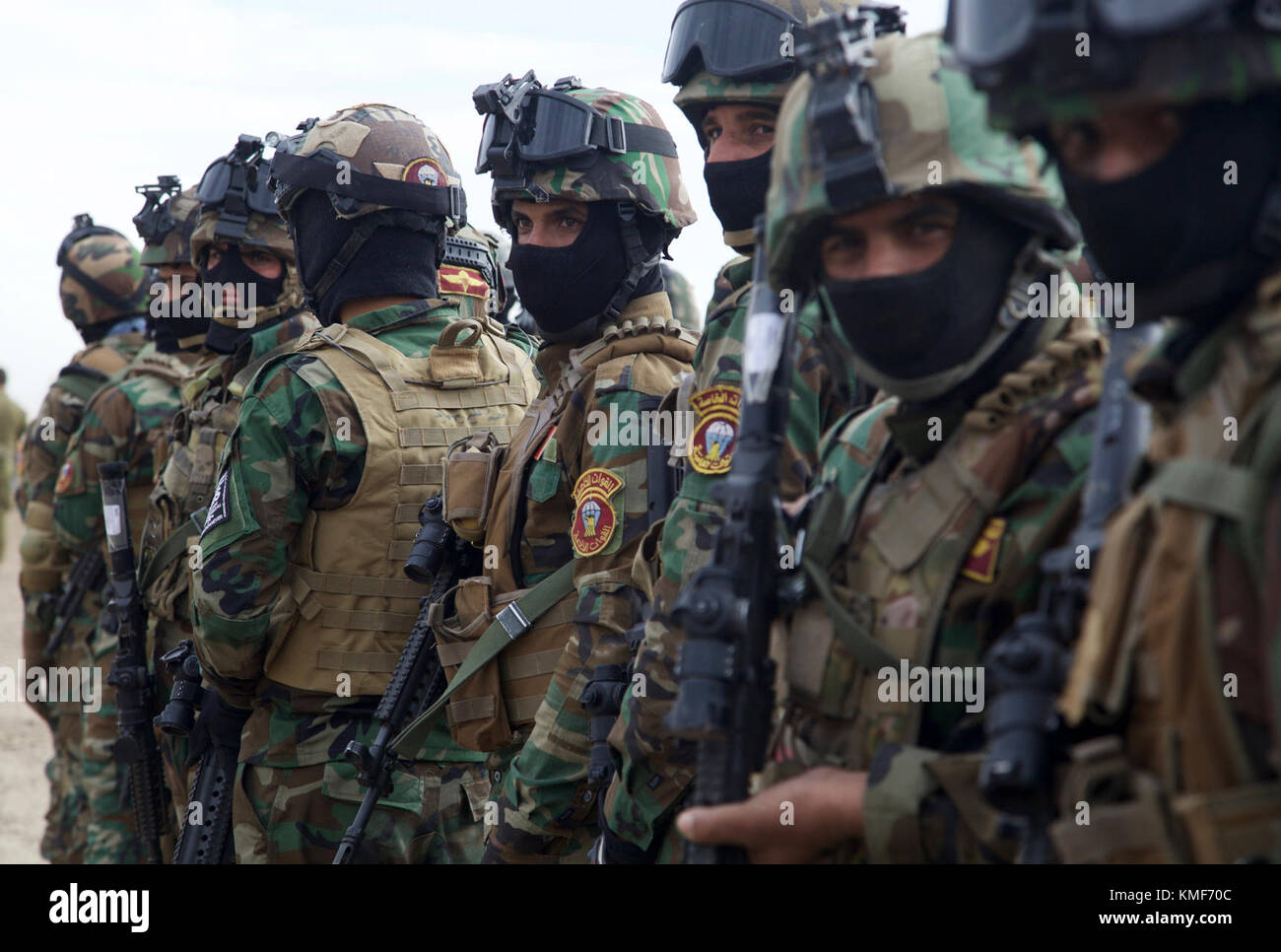 Members of the Iraqi Special Forces prepare to enter a training ...