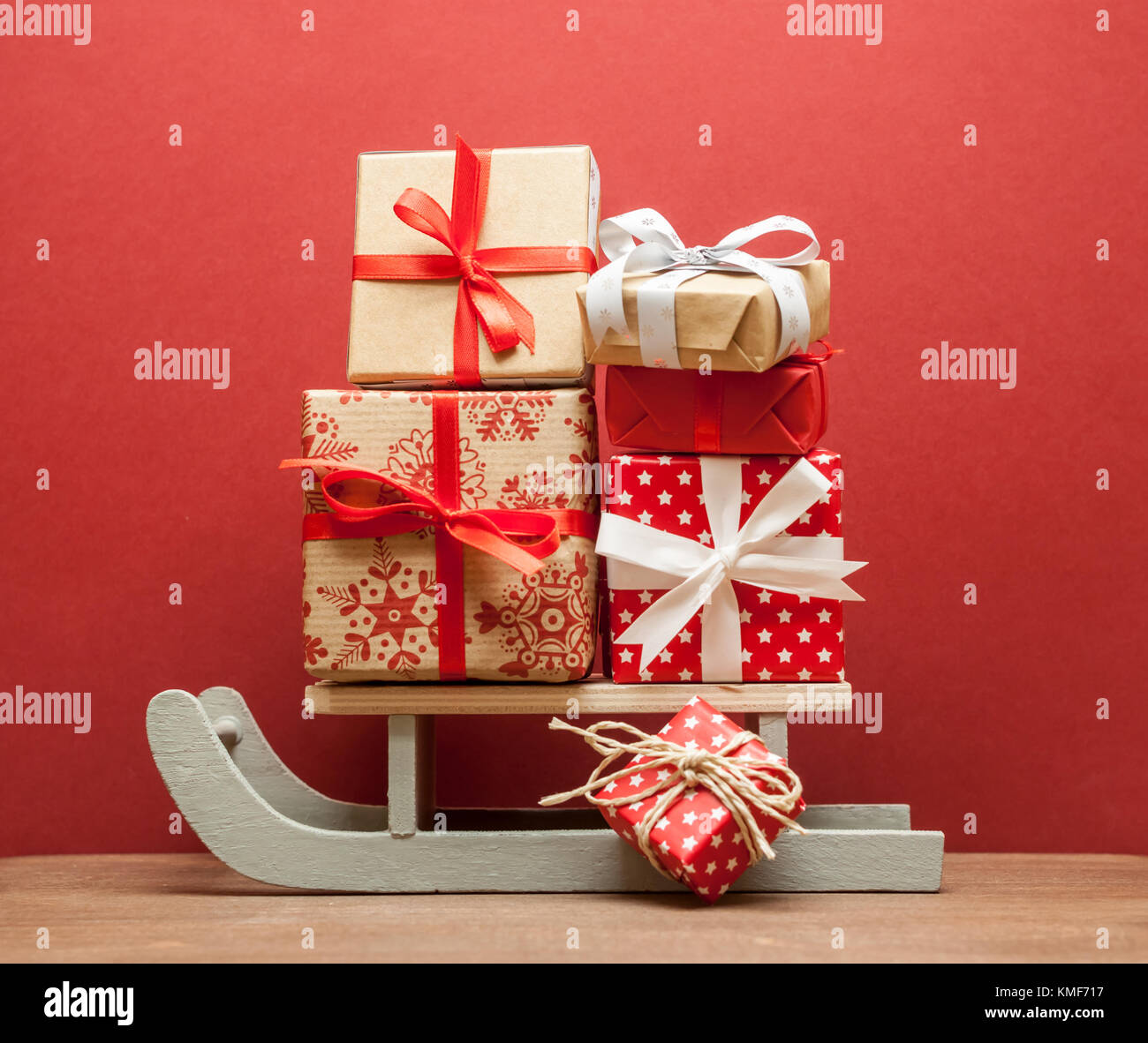 christmas sledges with presents Stock Photo - Alamy