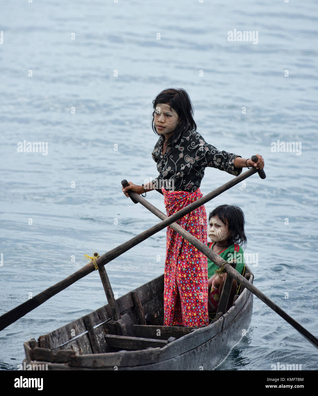 Moken girl rowing in the Mergui Archipelago, Myanmar Stock Photo - Alamy