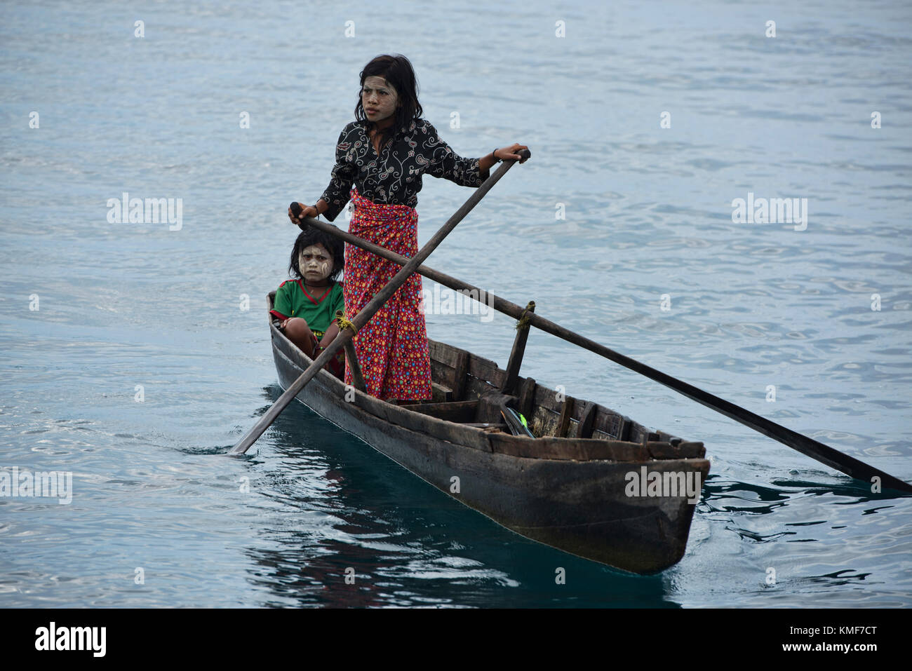 Moken girl rowing in the Mergui Archipelago, Myanmar Stock Photo - Alamy