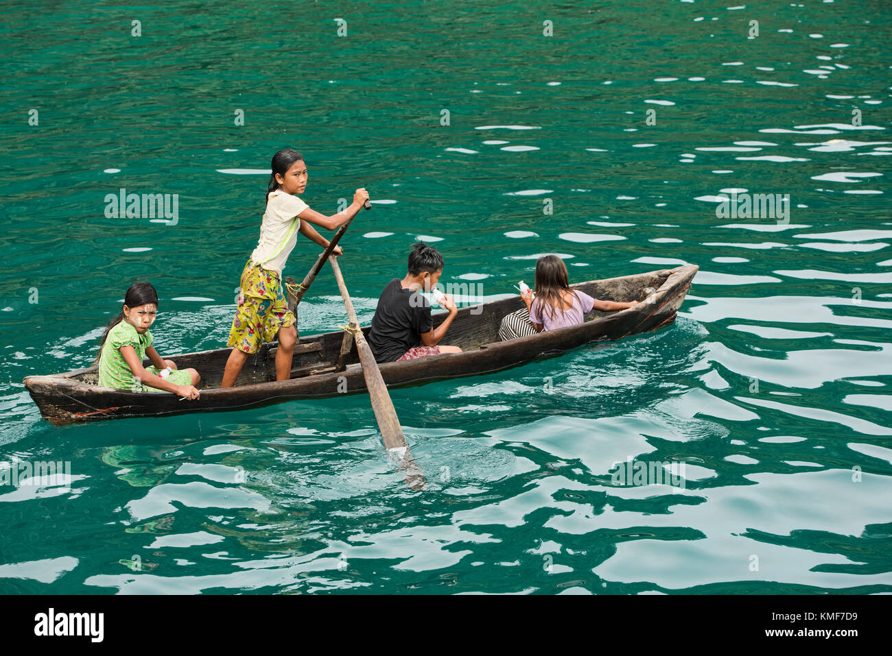 Moken girl rowing in the Mergui Archipelago, Myanmar Stock Photo - Alamy