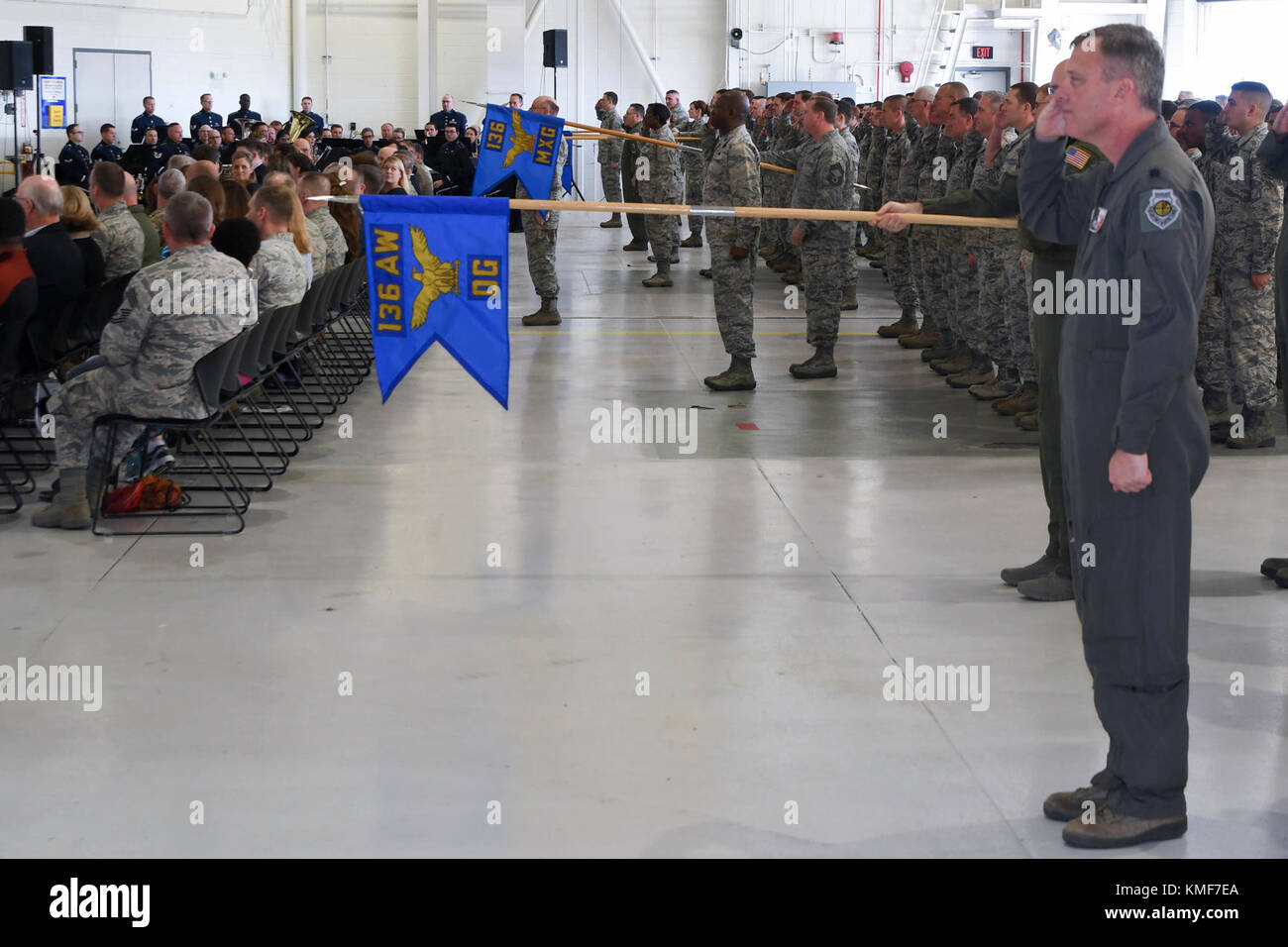 Members of the 136th Airlift Wing, Texas Air National, render their ...