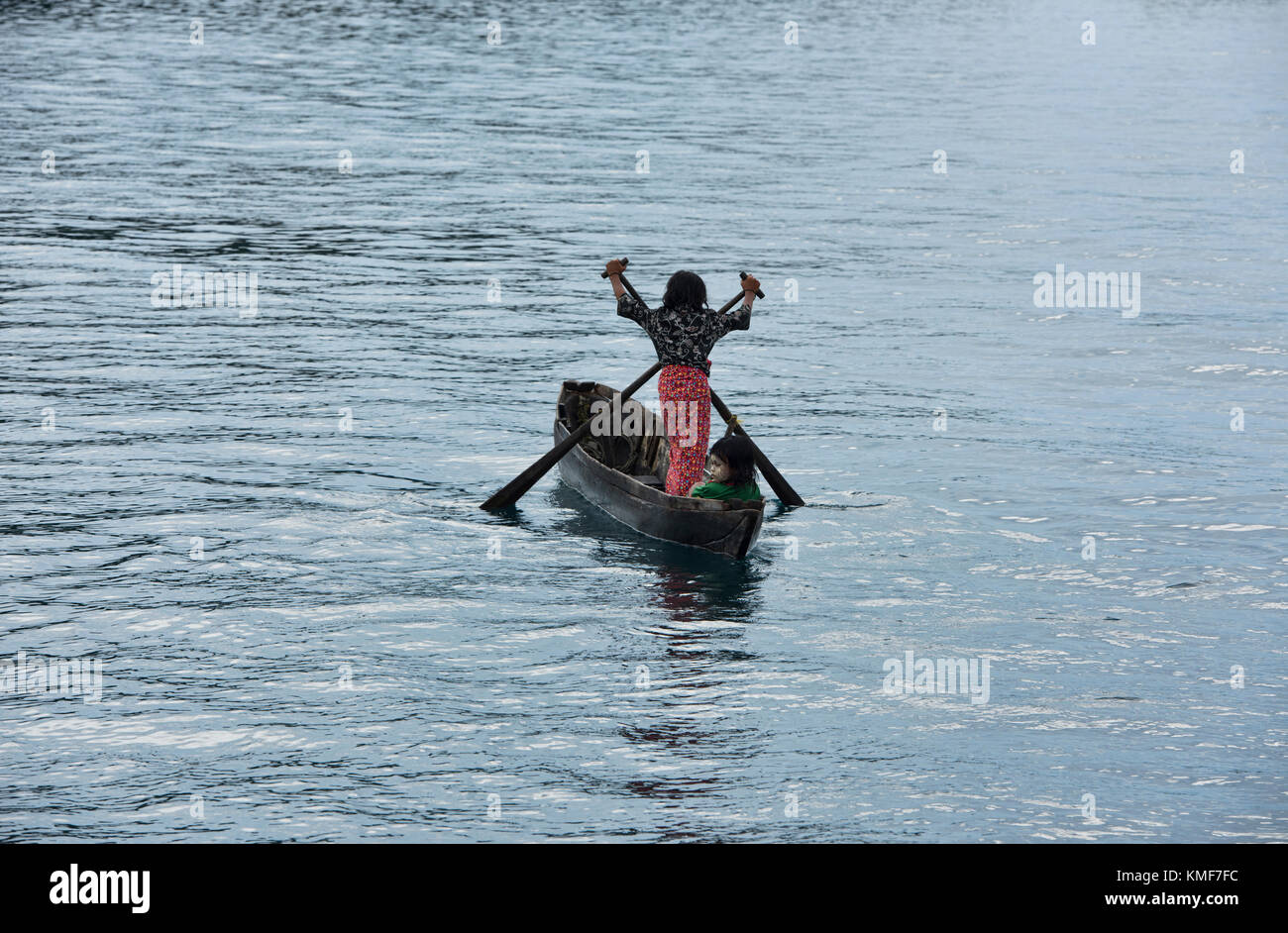 Moken girl rowing in the Mergui Archipelago, Myanmar Stock Photo - Alamy