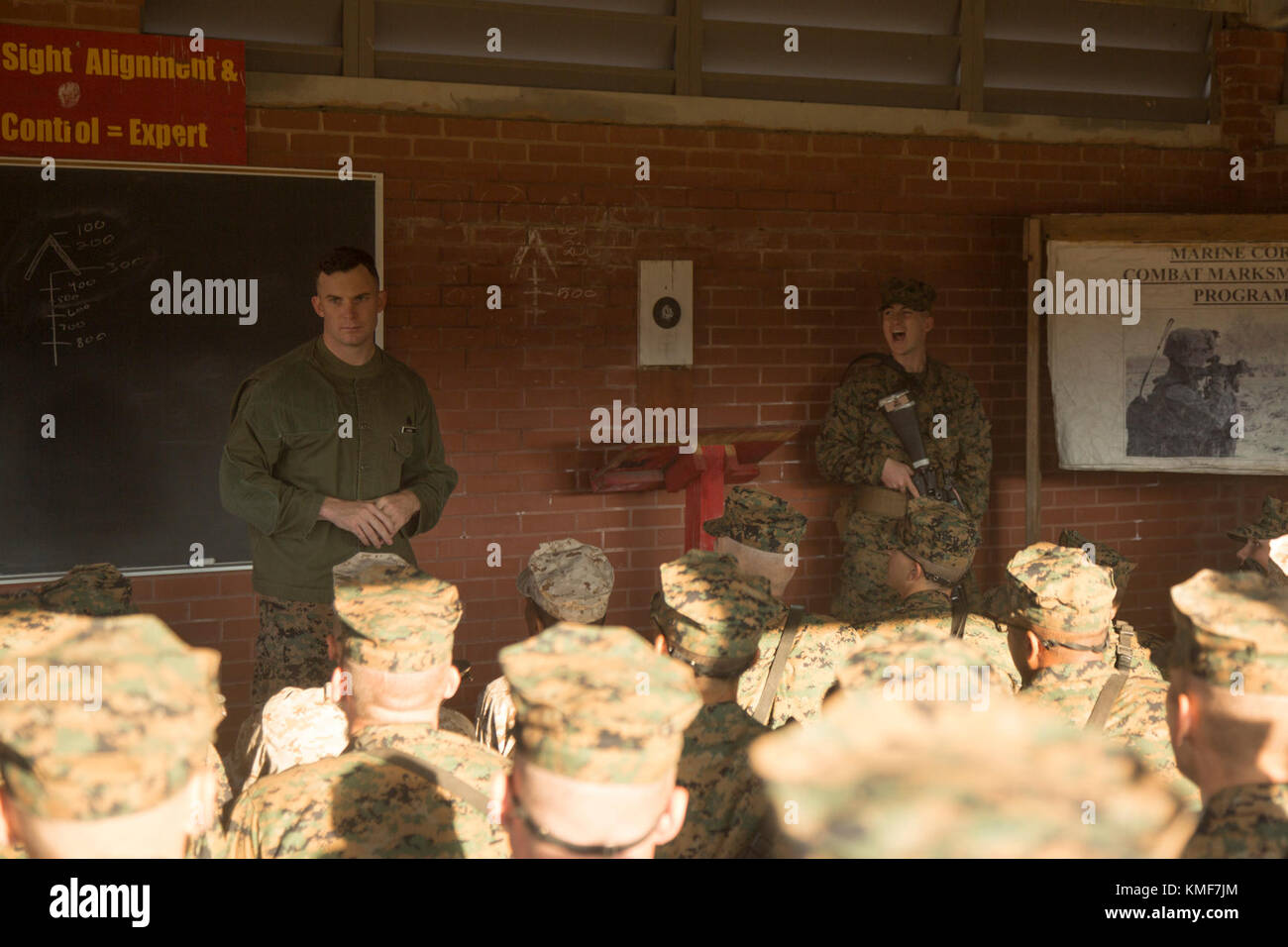 U.S. Marine Corps Sgt. John Lysen, Primary Marksmanship Instructor with ...