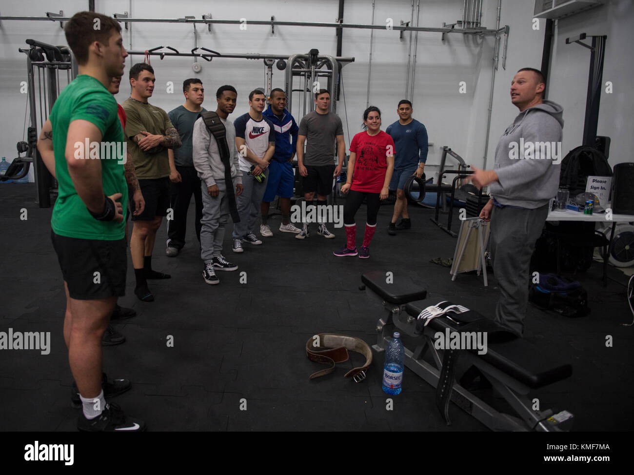 Chief Master-at-Arms Aaron Moore, right, assigned to Naval Support ...