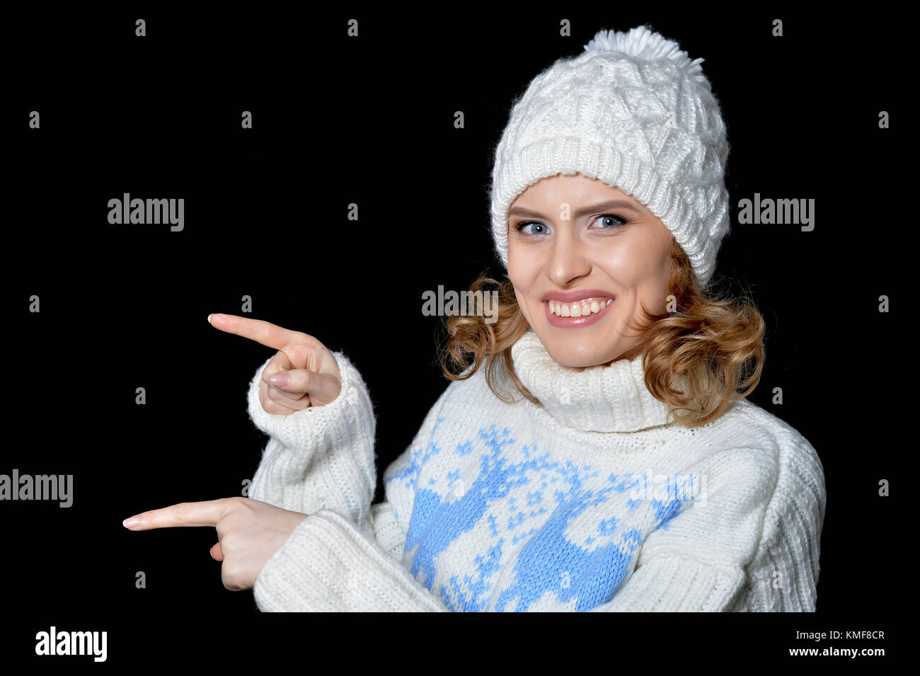 young woman showing something Stock Photo - Alamy