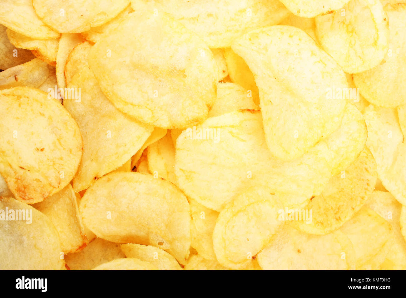 Chips pattern. Yellow salted potato chips as background. Chips texture ...