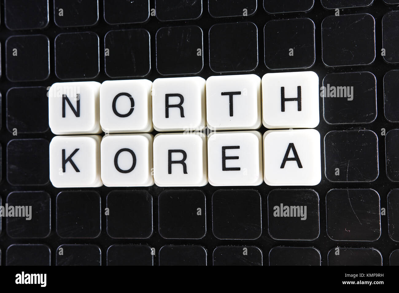 North Korea text word crossword. Alphabet letter blocks game texture ...