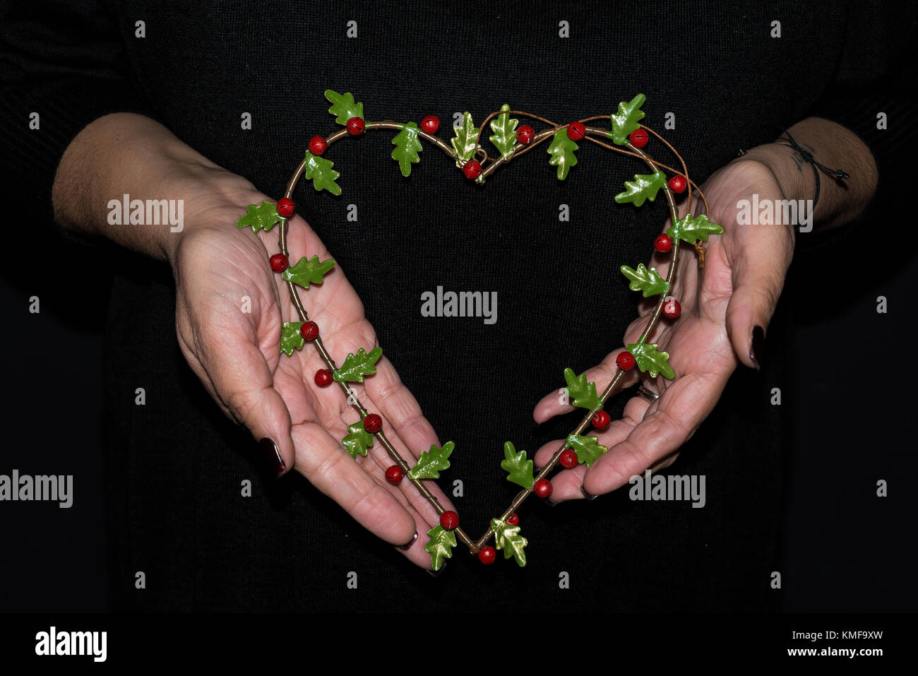 Mistletoe hands hi-res stock photography and images - Alamy