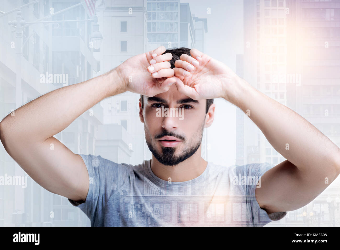 Handsome young man looking strong after visiting the gym Stock Photo ...