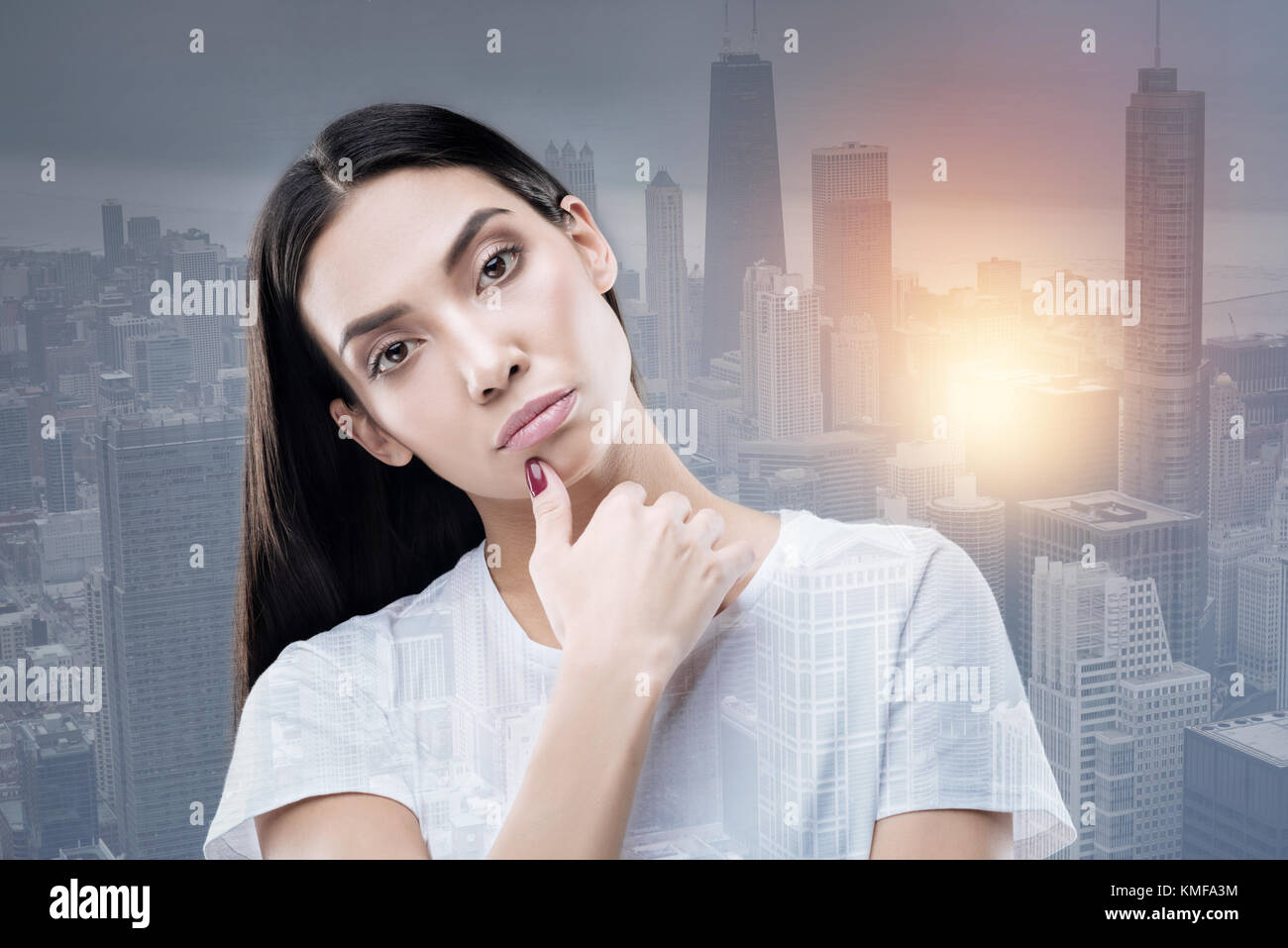 Smart enthusiastic manager evaluating the work of her team Stock Photo ...