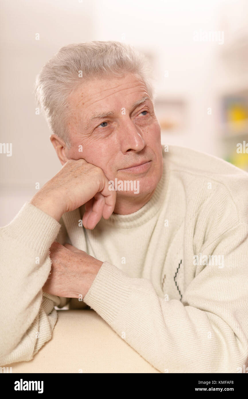 Sad senior man at home Stock Photo - Alamy