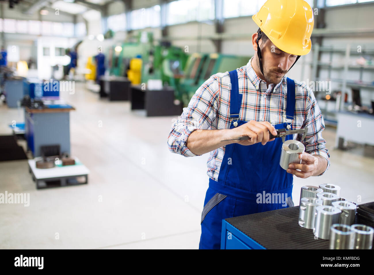 Supervisor doing quality control and pruduction check in factory Stock ...